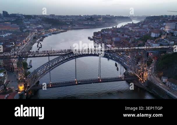 Aerial perspective of Porto city and the iconic Dom Luis I Bridge over ...