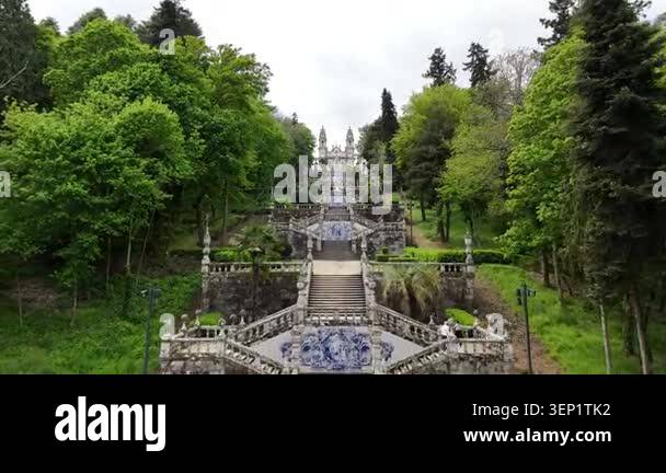 Ascending the grand baroque staircase at Bom Jesus do Monte in Braga ...