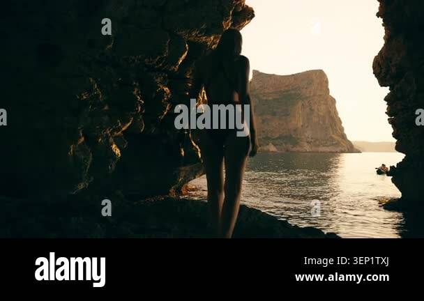 beautiful girl with a backpack in the mountains Stock Video Footage - Alamy