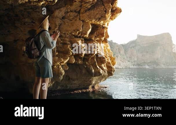 young man traveler with backpack walking in the mountains Stock Video ...