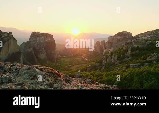 Majestic sunset landscape over the Meteora monastery complex, Greece ...