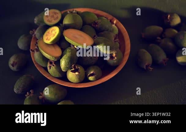 Feijoa green fruit bowl. Vegetarian food harvest Stock Video Footage ...