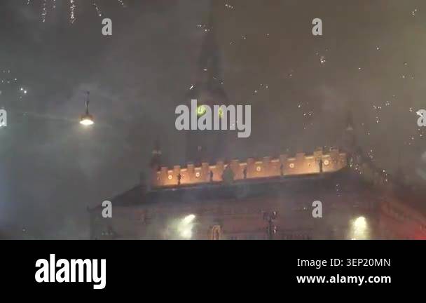 Fireworks over historic building with tower in night city Stock Video ...