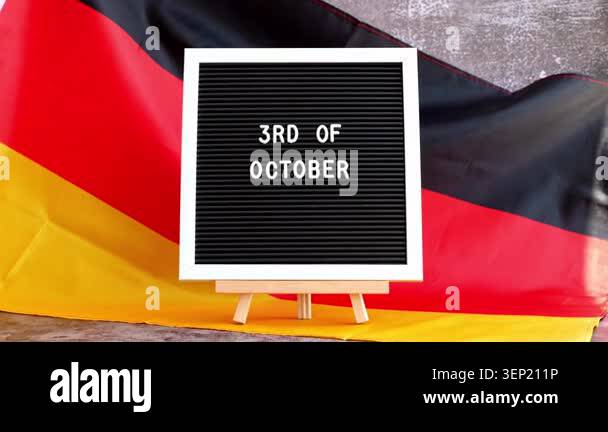 Letter board with message 3rd OF OCTOBER Unity day National symbol of ...