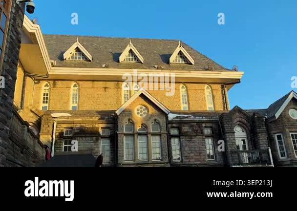 historic colonial architecture building illuminated by golden sunlight ...