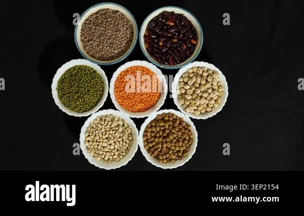 high nutrient variety of dried beans lentils and chickpeas arranged in ...