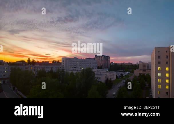 Wide angle sunset timelapse showing soft orange horizon light and ...