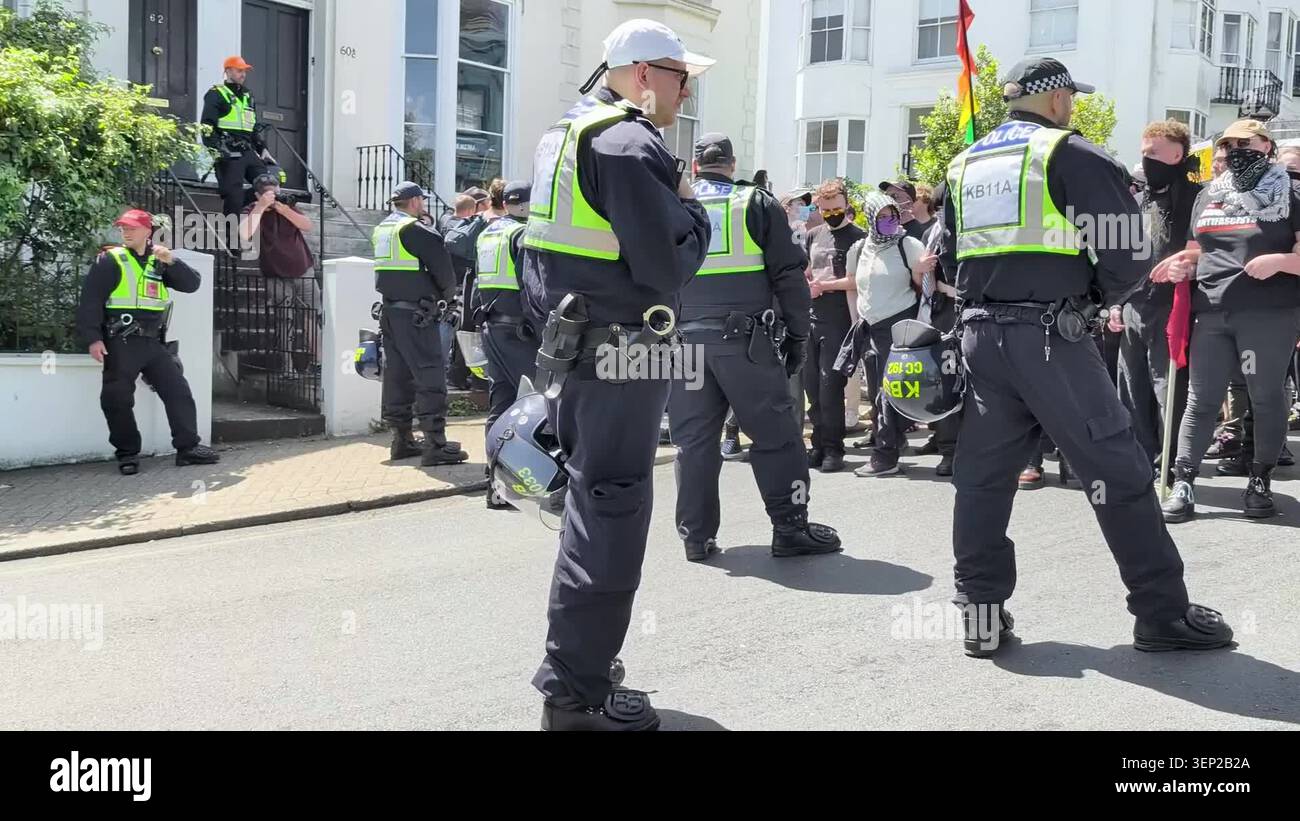 Police separate protesters in Brighton Stock Video Footage - Alamy