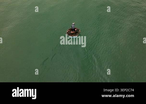 Vietnamese Fishermen in Traditional Thung chai Boat. The Sea near Da ...