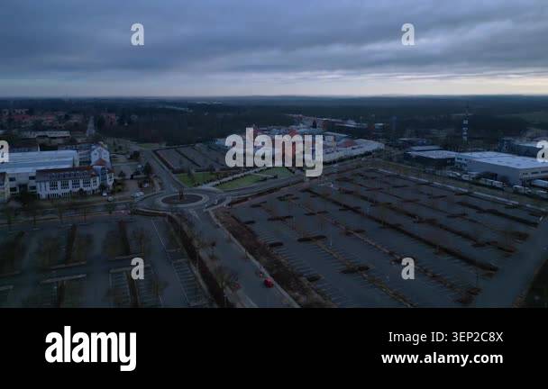 Drone view showing a large shopping retail park with various commercial ...