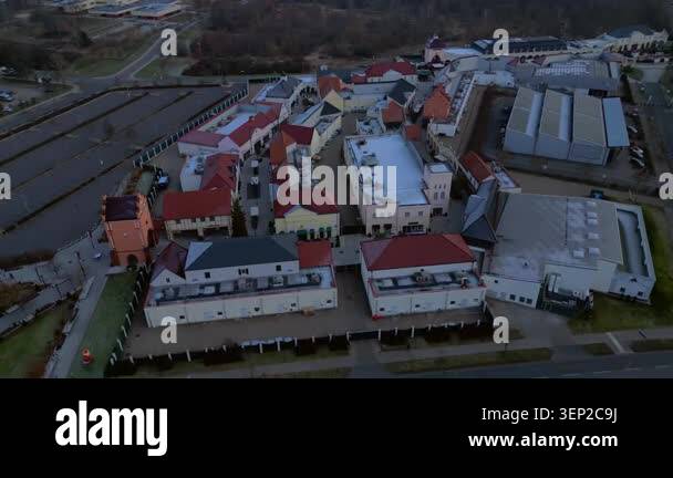 speed ramp time lapse capturing a large shopping outlet center with ...