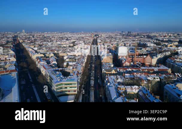 Aerial view of berlin city showing snow covered rooftops, buildings ...
