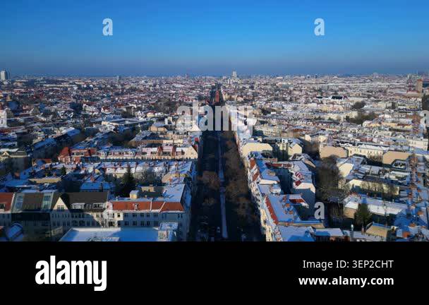 Aerial view of berlin city showing snow covered rooftops, buildings ...