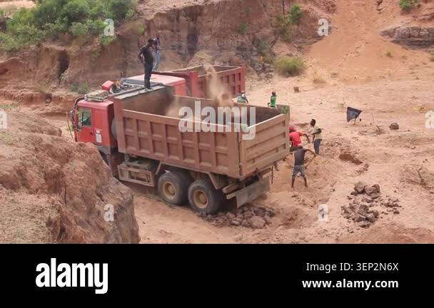 WUKRO, ETHIOPIA - MARCH 22, 2019: Local people loading sand into a ...