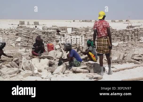 DANAKIL, ETHIOPIA - MARCH 24, 2019: Afar tribe salt miners in the ...
