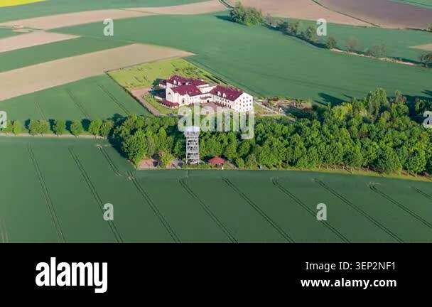 Aerial drone view of observation tower in Pietrowice Wielkie surrounded ...