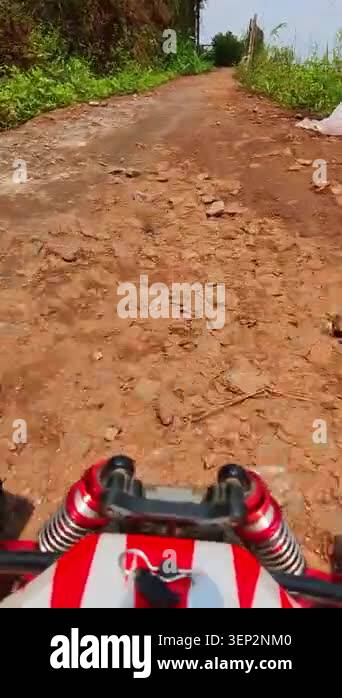 4K Videos of Red and white Remote Controlled car rides dirt track ...