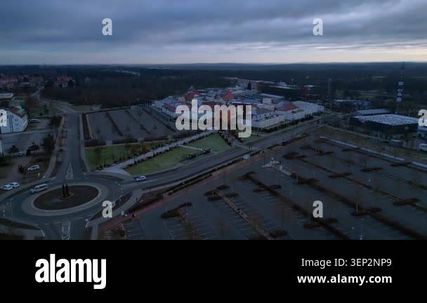 Drone view showing a large shopping retail park with various commercial ...