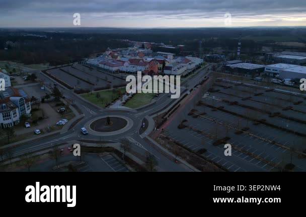 Drone view showing a large shopping retail park with various commercial ...