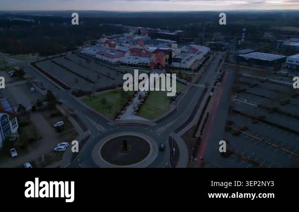 Drone view showing a large shopping retail park with various commercial ...
