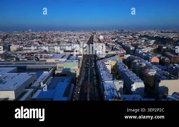 Aerial view of berlin city showing snow covered rooftops, buildings ...