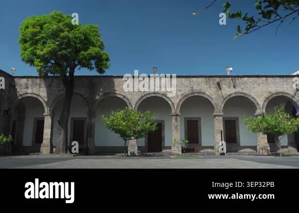 Handheld 4K footage moves across the historic interior facade of ...