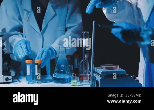 scientist in protective gloves working in laboratory Stock Video ...