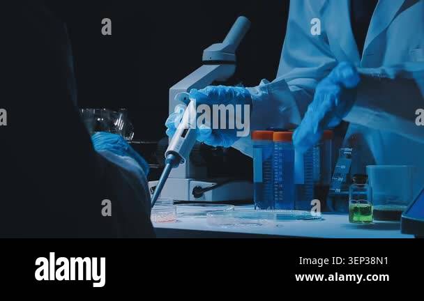 laboratory worker with a glass of water Stock Video Footage - Alamy