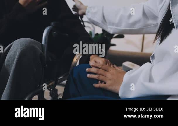 close - up of a young couple with a wheelchair Stock Video Footage - Alamy
