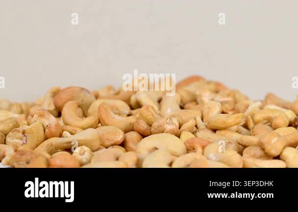 Close-up video of roasted cashews Stock Video Footage - Alamy