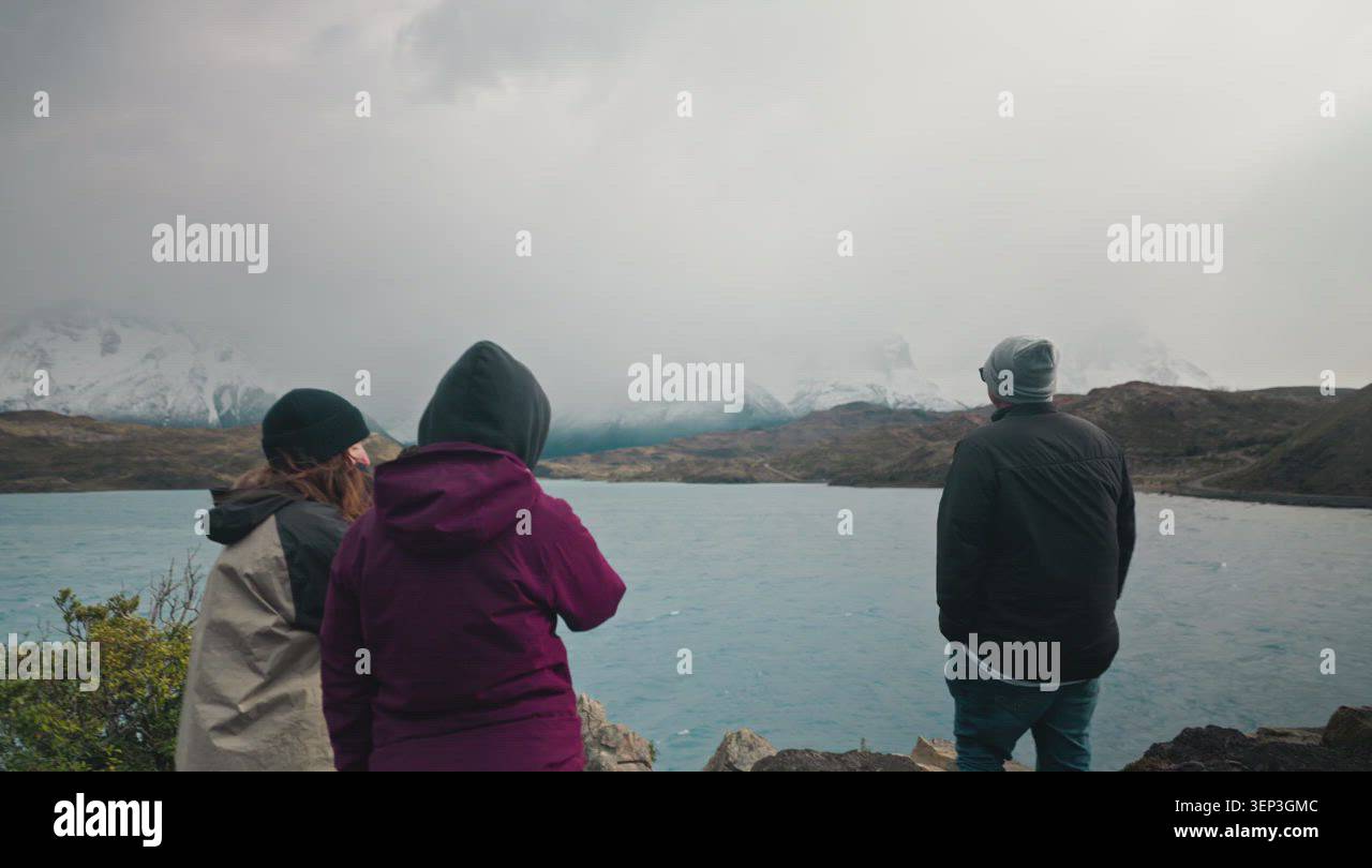 Friends above Nordenskjöld Lake in the wind Stock Video Footage - Alamy