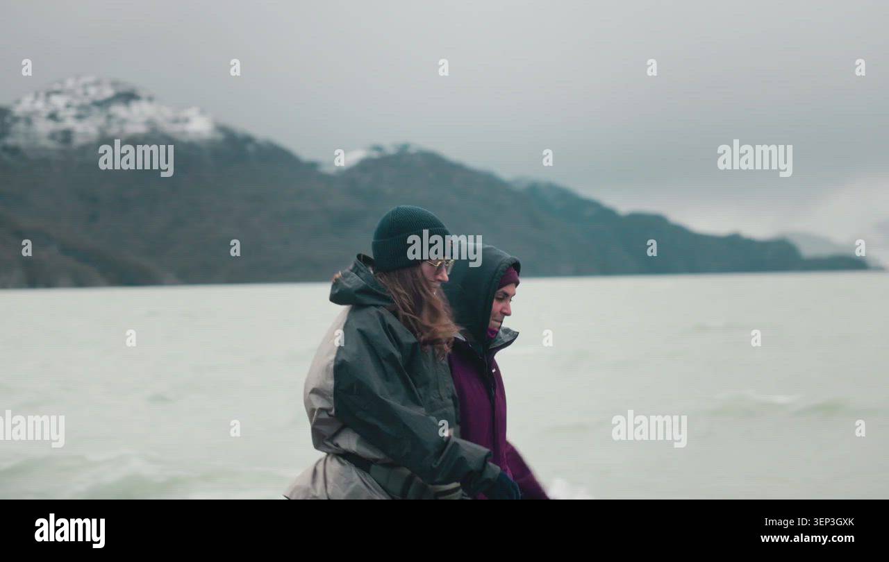 Two girls in gray Patagonia Stock Video Footage - Alamy