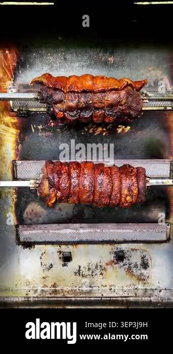 Slow roasted pork belly porchetta with crispy golden crackling Stock ...
