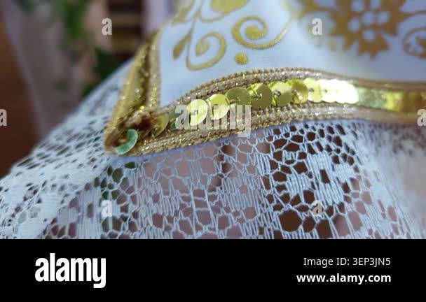 Detail of traditional moravian folklore costume lace fabric with gold ...