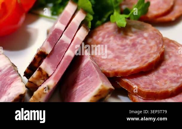 A close-up of lard and sausage on a plate Stock Video Footage - Alamy