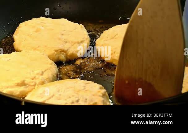 cooking a delicious fried pan with fried potatoes Stock Video Footage ...