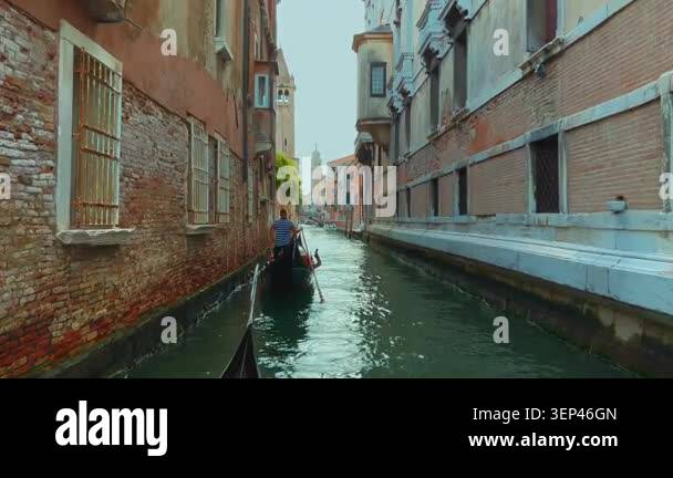 Venice Italy Narrow Residential Canal With Gondolier Steering Between ...