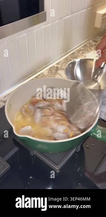 Asian female influencer cooking vlog video using smartphone showing ...