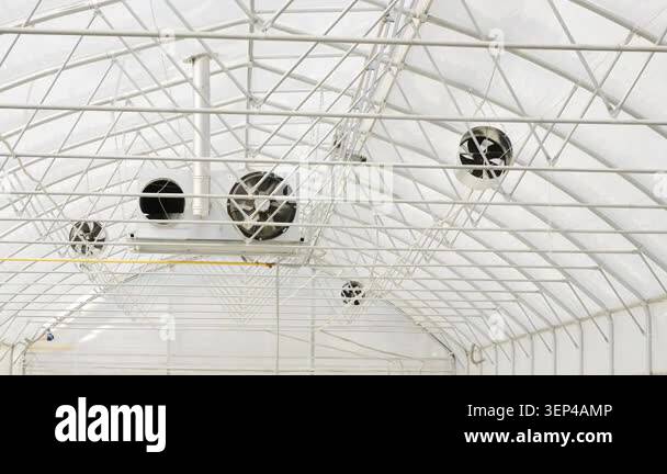 Industrial greenhouse ventilation and climate control system. Modern ...