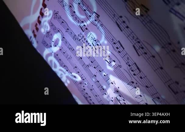 Holographic music notes dancing across classical sheet music, blending ...