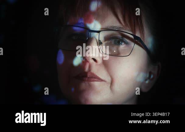 Romantic portrait of a woman illuminated by heart-shaped light ...