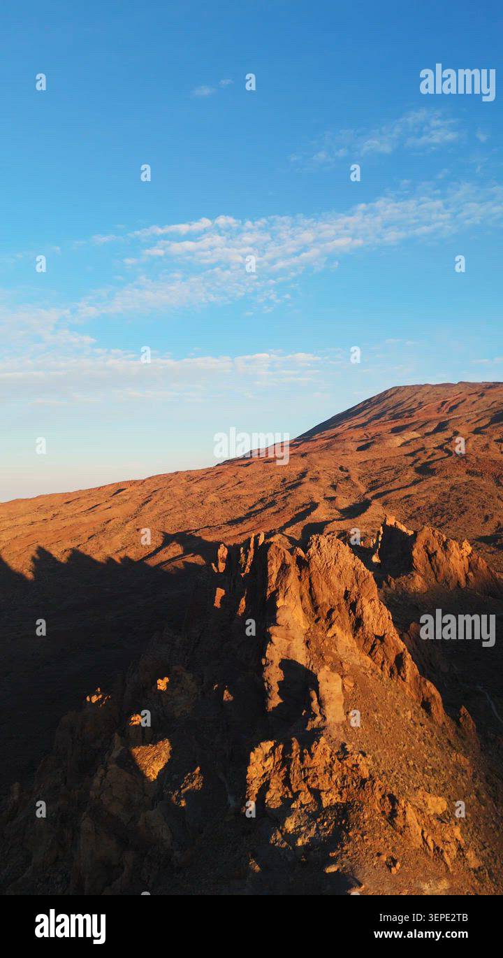 Drone view of volcanic cliffs at sunrise on Tenerife island, Spain ...