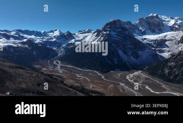 Beautiful high altitude hanging glacier and snow capped mountain with ...
