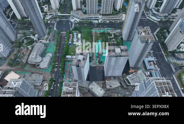 Aerial drone footage capturing a sprawling urban landscape with ...