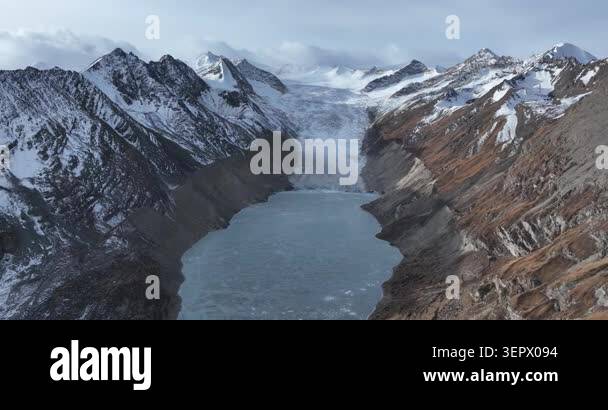 Beautiful high altitude hanging glacier and snow capped mountain with ...