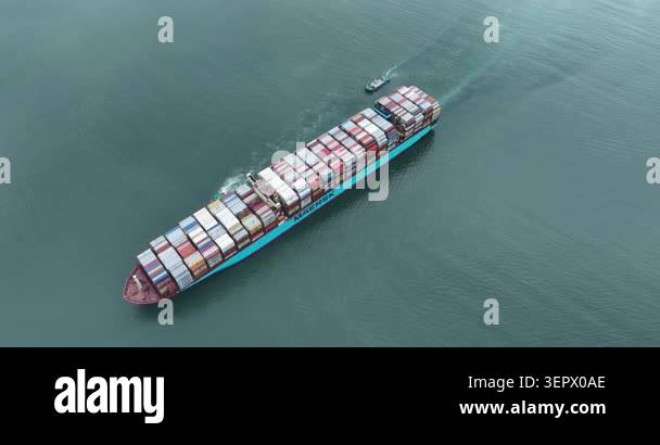 Maersk logo, Aerial view of a large container ship sailing on the ocean ...