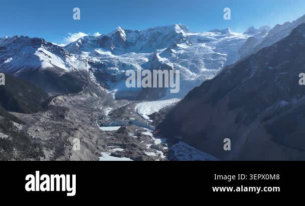 Beautiful high altitude hanging glacier and snow capped mountain with ...