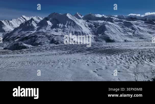 Beautiful high altitude hanging glacier and snow capped mountain with ...