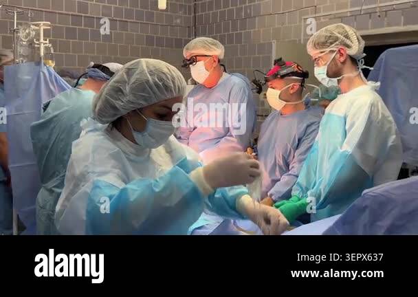 Kharkiv, Ukraine - April, 16, 2026: Surgeons standing around an ...