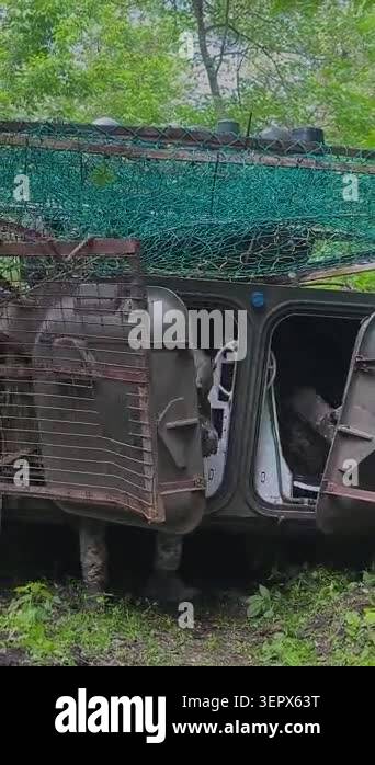 Soldiers in full combat gear disembark from an armored combat vehicle ...